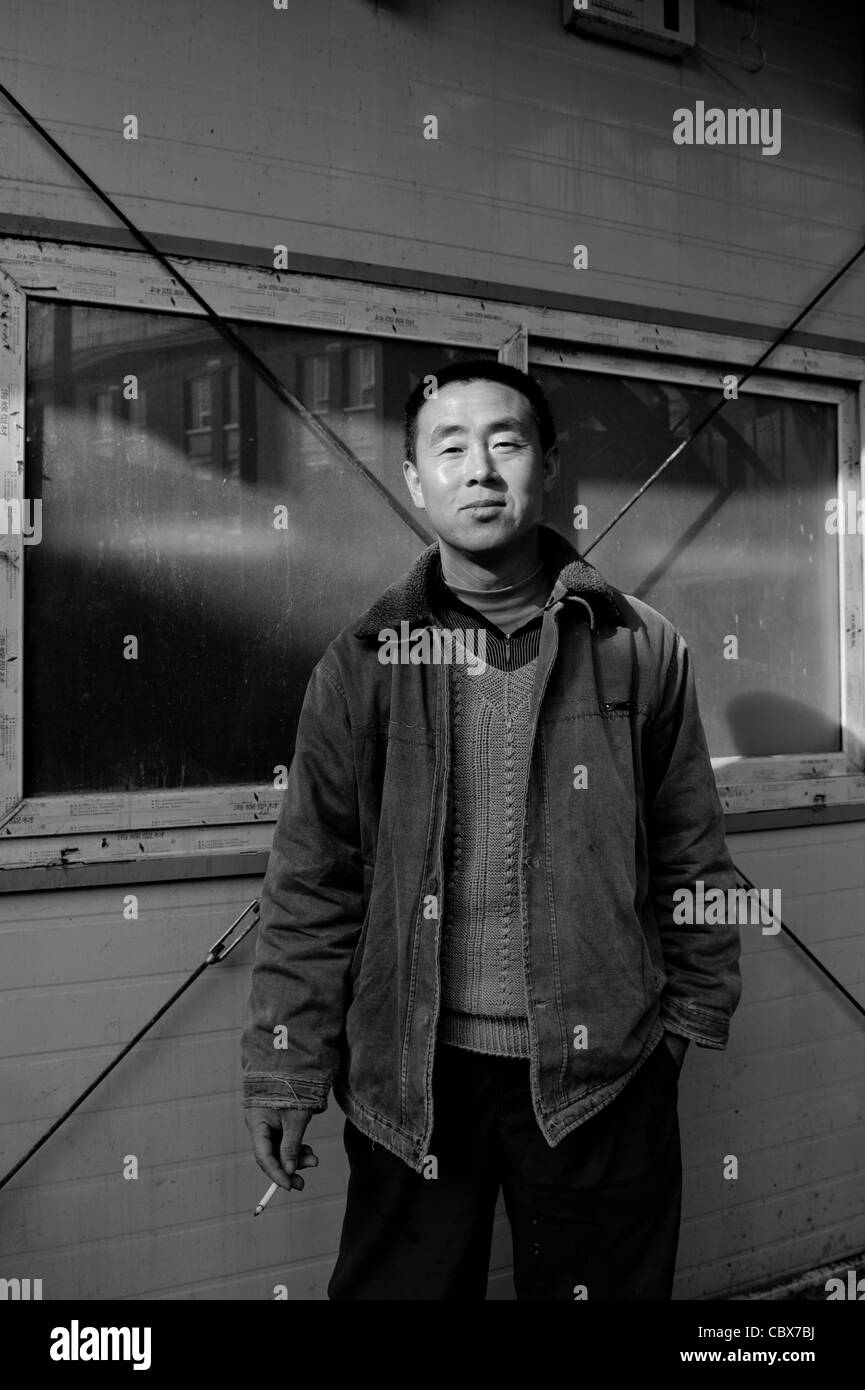 Vertical image worker in Black and White Stock Photos & Images - Alamy