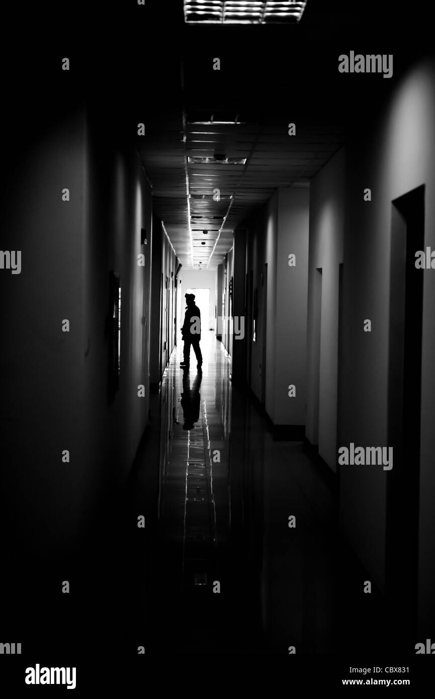 Night security guard silhouette Black and White Stock Photos & Images ...