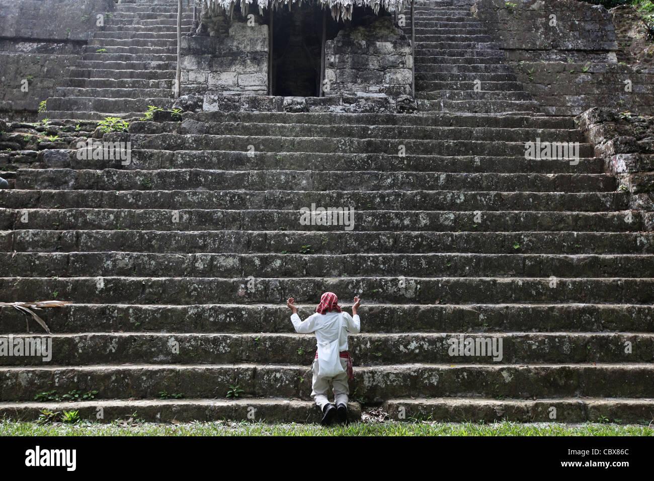 Maya priest doing a traditional ceremony, Tikal, Guatemala Stock Photo ...