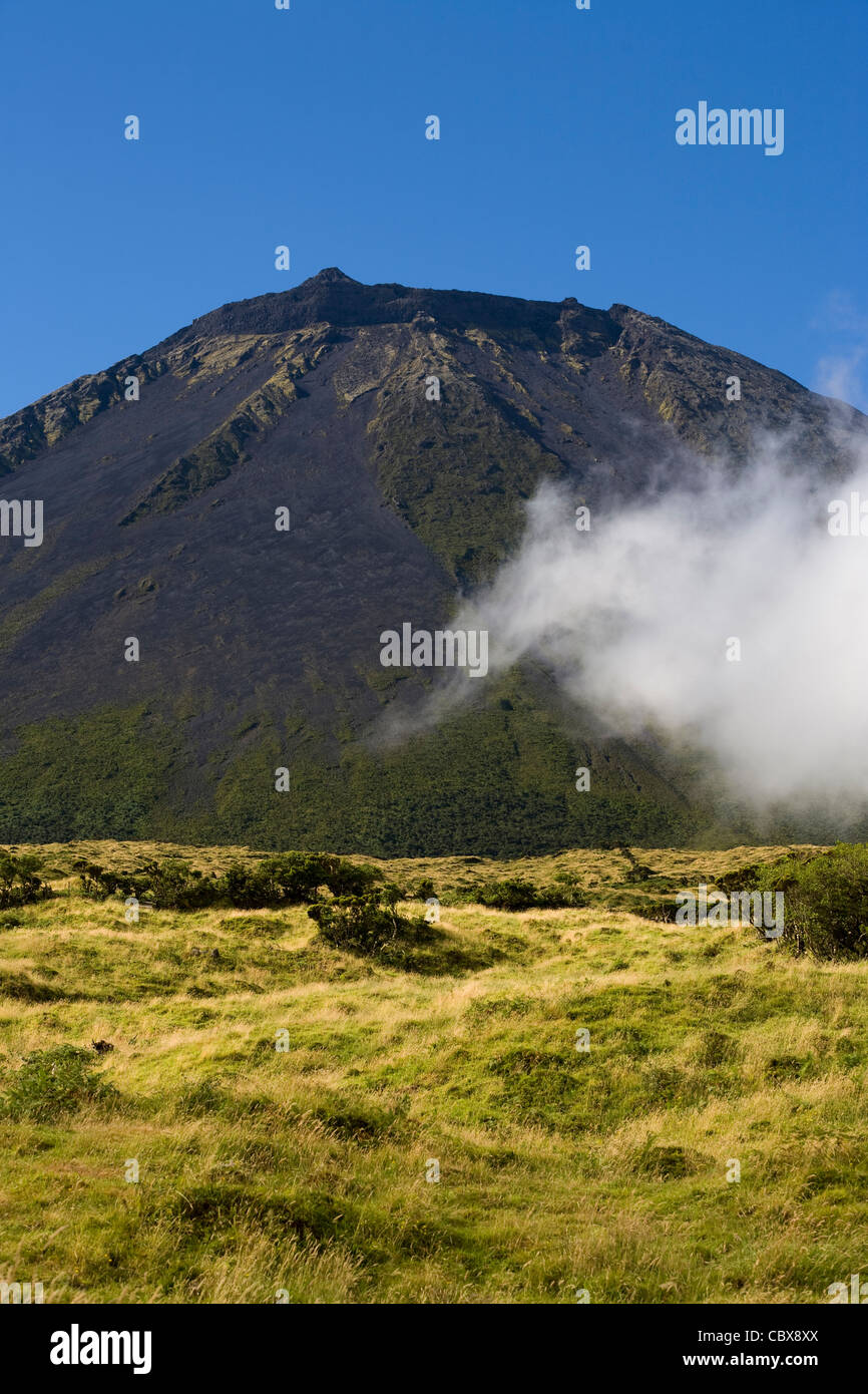 Pico mountain through the mist on the island of Pico, Azores Stock ...