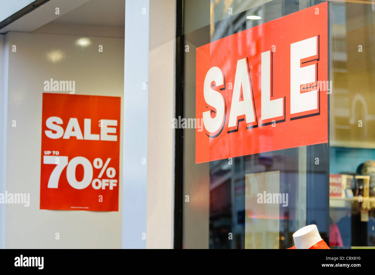 Sign in window of a shop saying "Sale, 70% off Stock Photo - Alamy