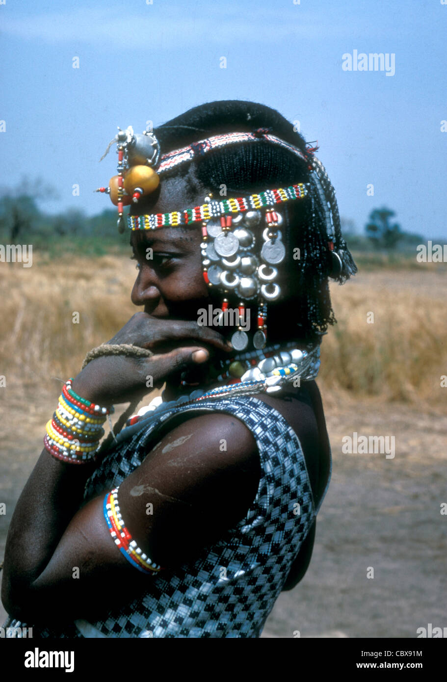 Fulani girl wearing traditional silver and bead jewellery in Senegal ...