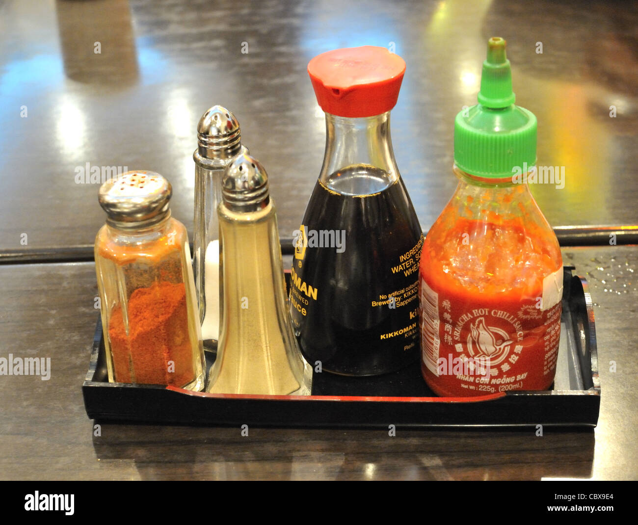 Chinese restaurant condiments of soya sauce, chiily sauce, salt and ... Chinese restaurant condiments of soya sauce, chiily sauce, salt and ...