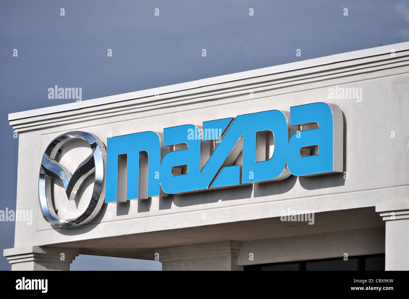 Mazda sign and logo are on a building on December 23 2011 Stock Photo ...