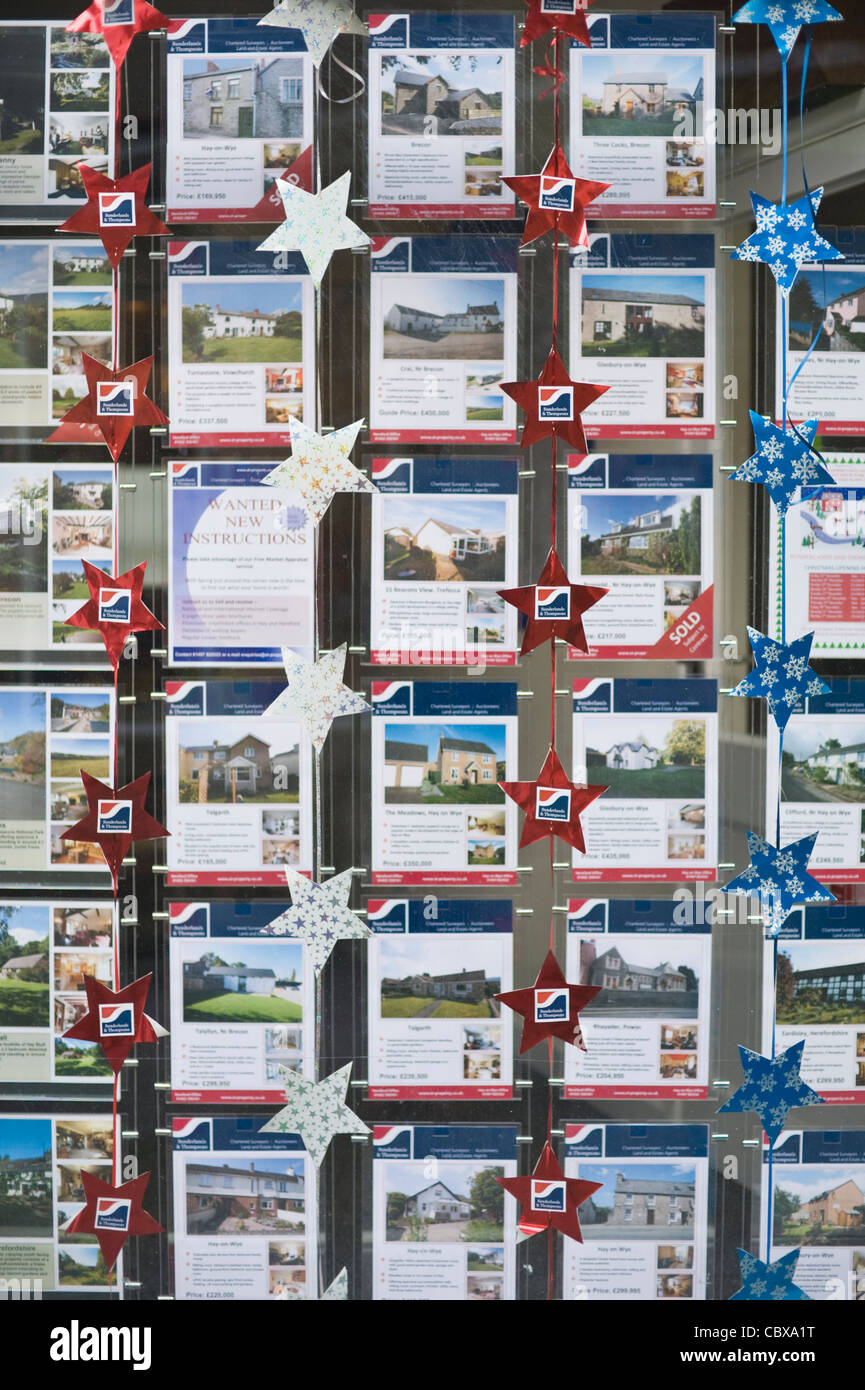 Xmas Christmas window display of local Estate Agent shop in Hay-on-Wye ...