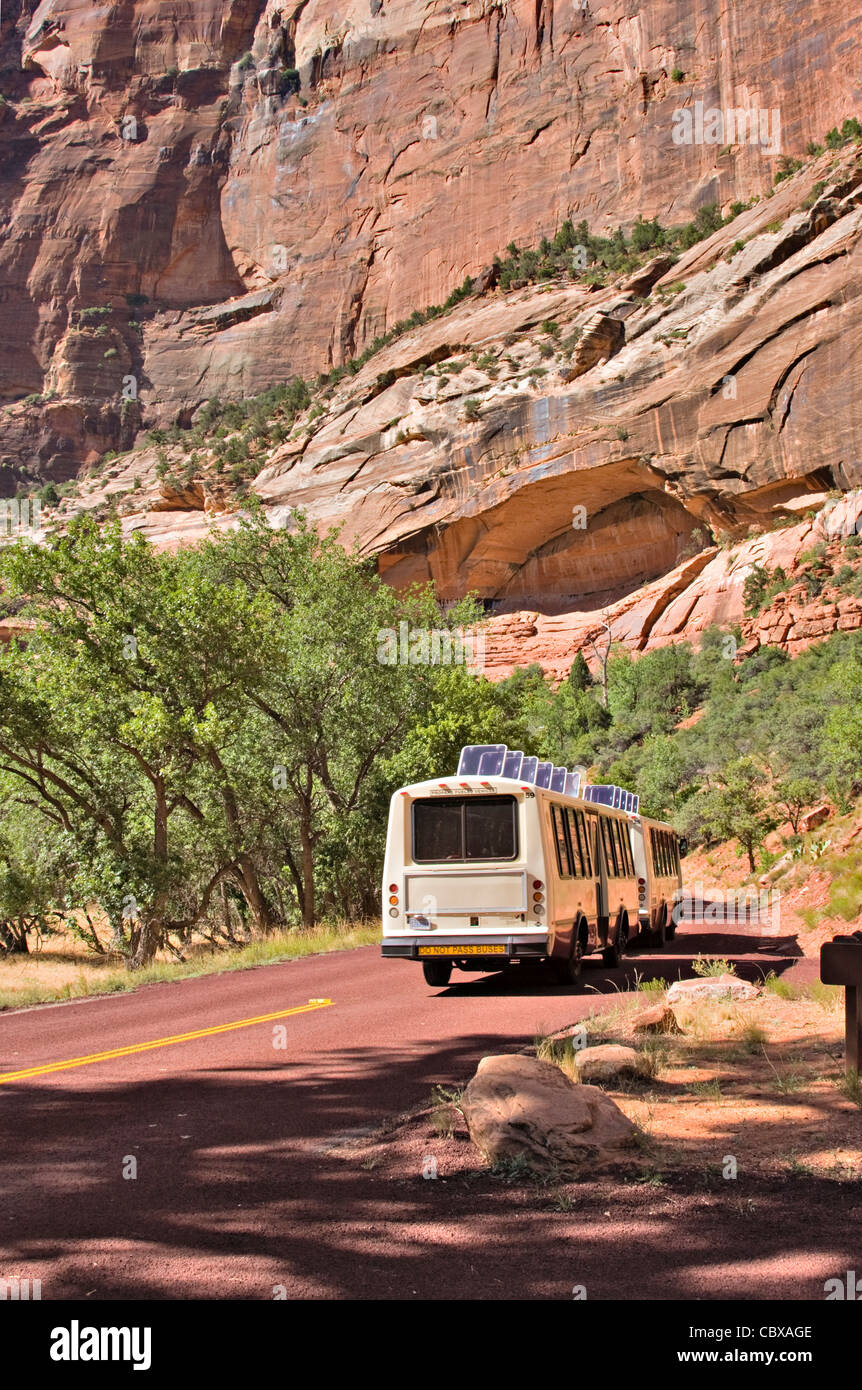 Shuttle Bus in Zion Canyon, Utah. A shuttle bus leaves the stop at ...