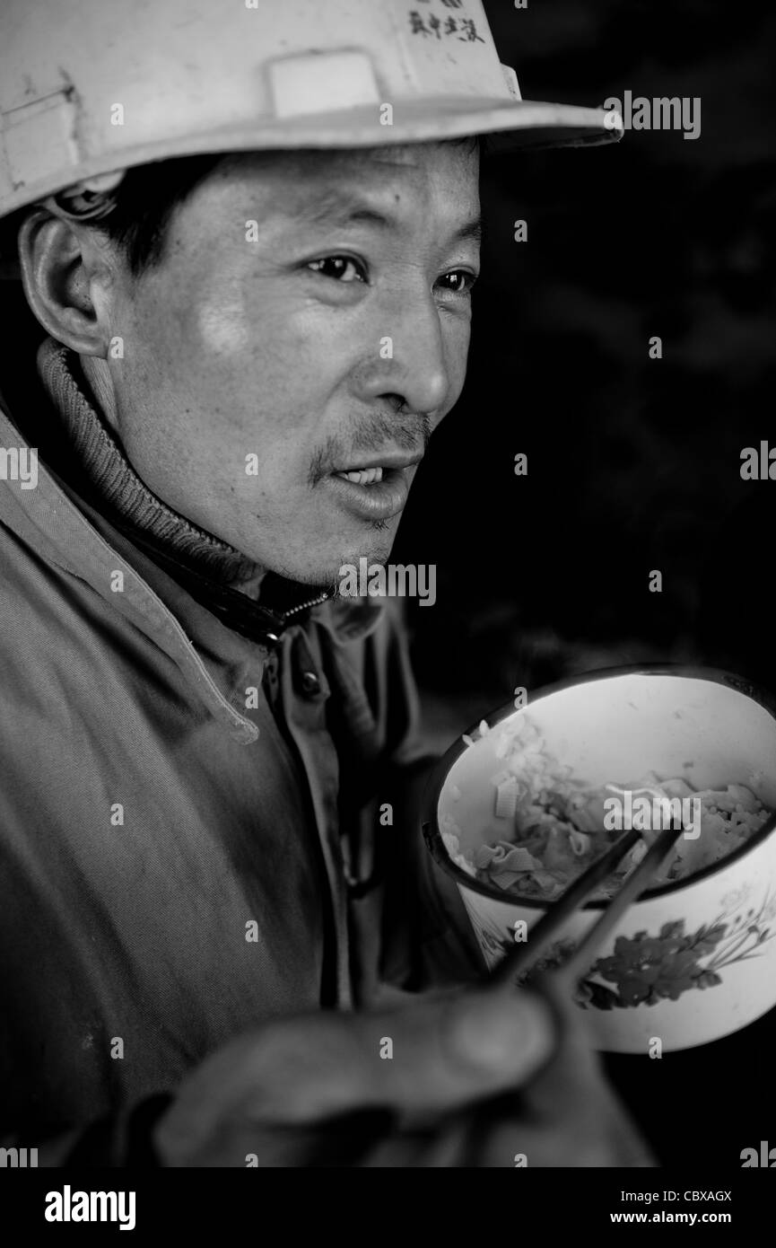Chinese migrant worker Black and White Stock Photos & Images - Alamy