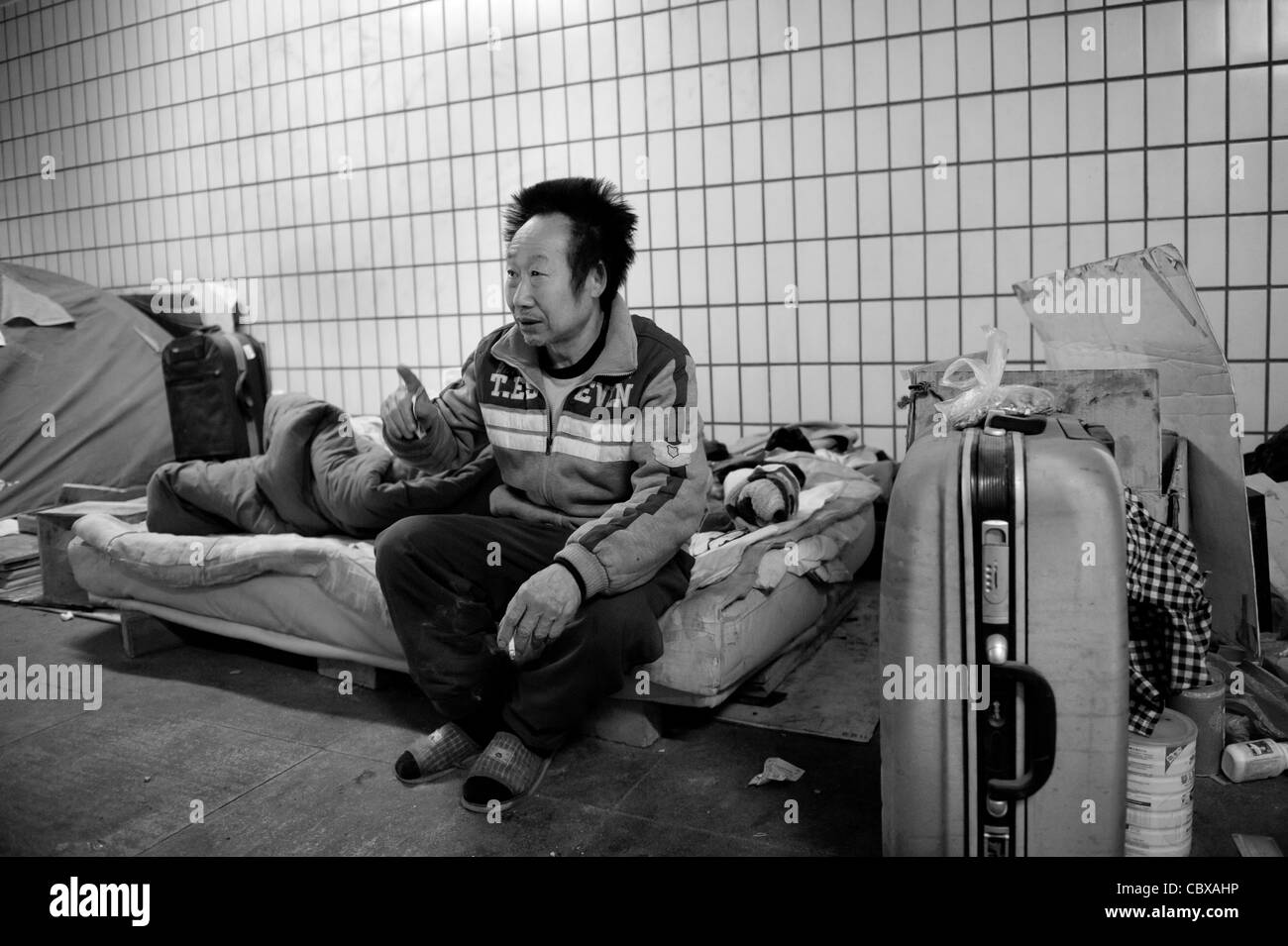 Chinese homeless person Black and White Stock Photos & Images - Alamy