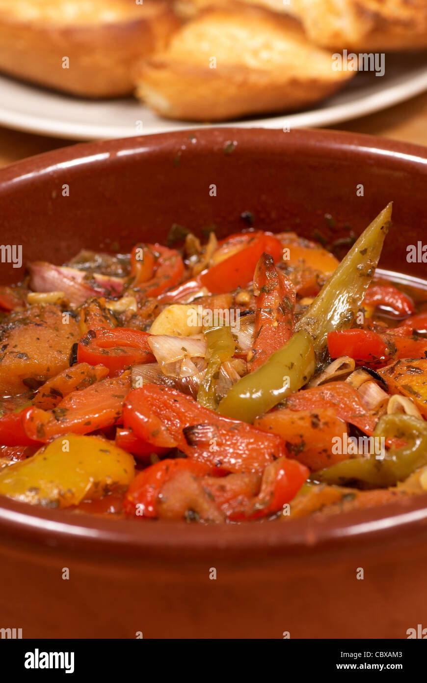 Traditional Spanish vegetable stew, pisto, served in a clay pot Stock ...