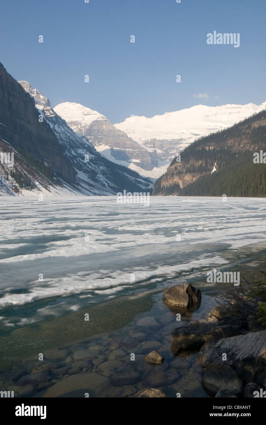 Frozen lake and mountains, Lake Louise, Banff, Alberta, Canada Stock ...