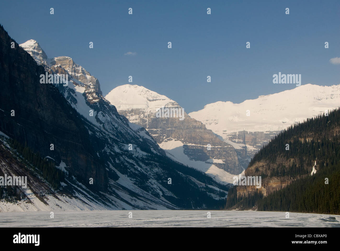 Frozen lake and mountains, Lake Louise, Banff, Alberta, Canada Stock ...