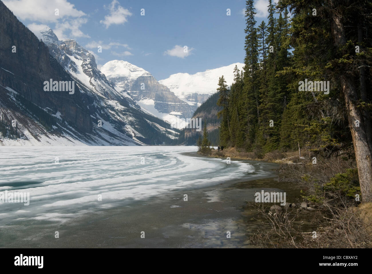 Frozen lake and mountains, Lake Louise, Banff, Alberta, Canada Stock ...
