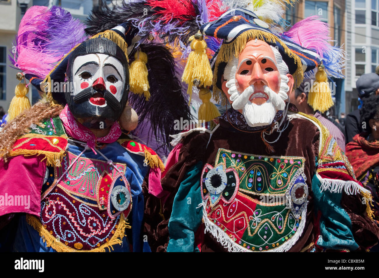 Masked participants at annual Carnaval festival in Mission District ...