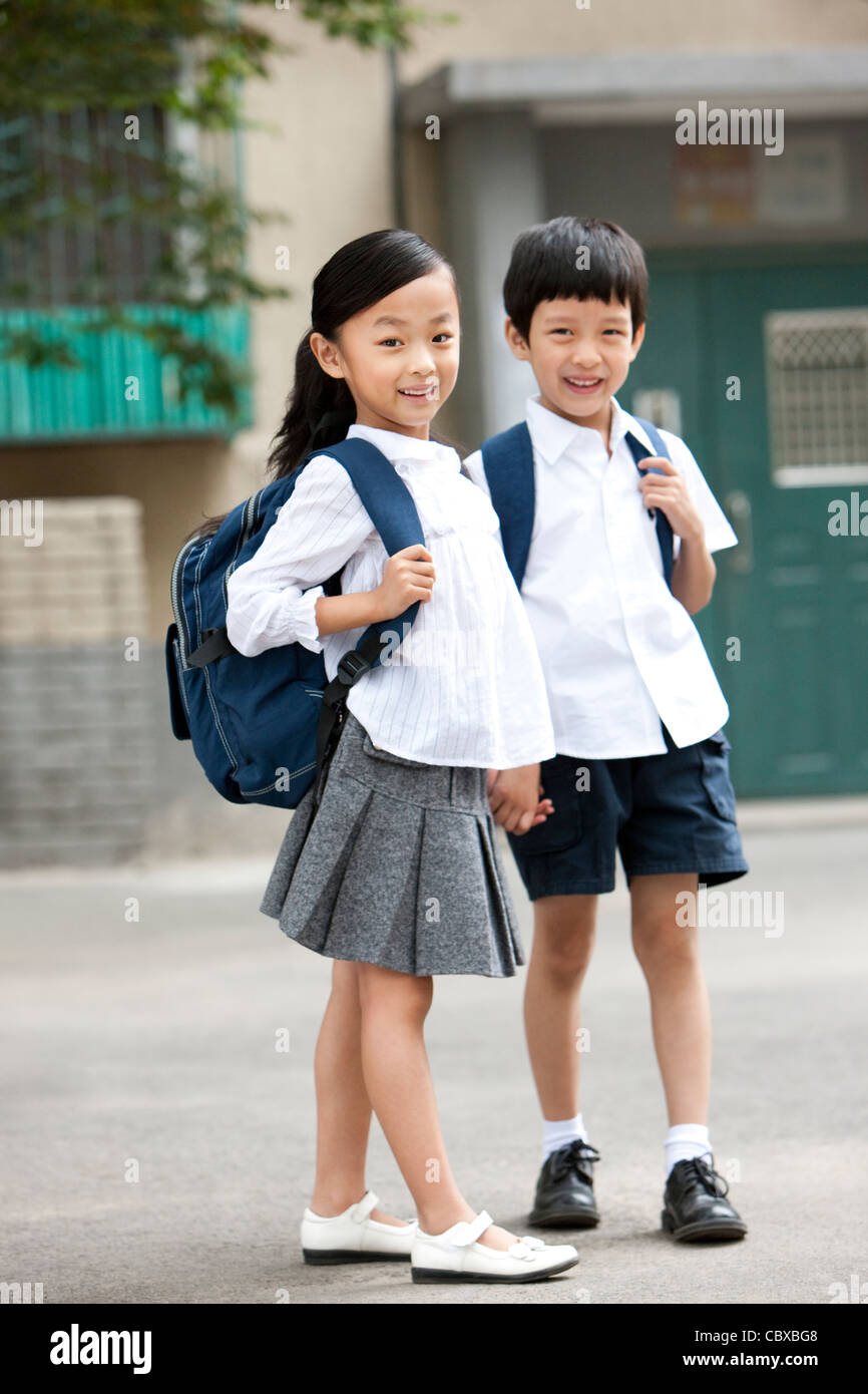 Children coming home from school Stock Photo - Alamy