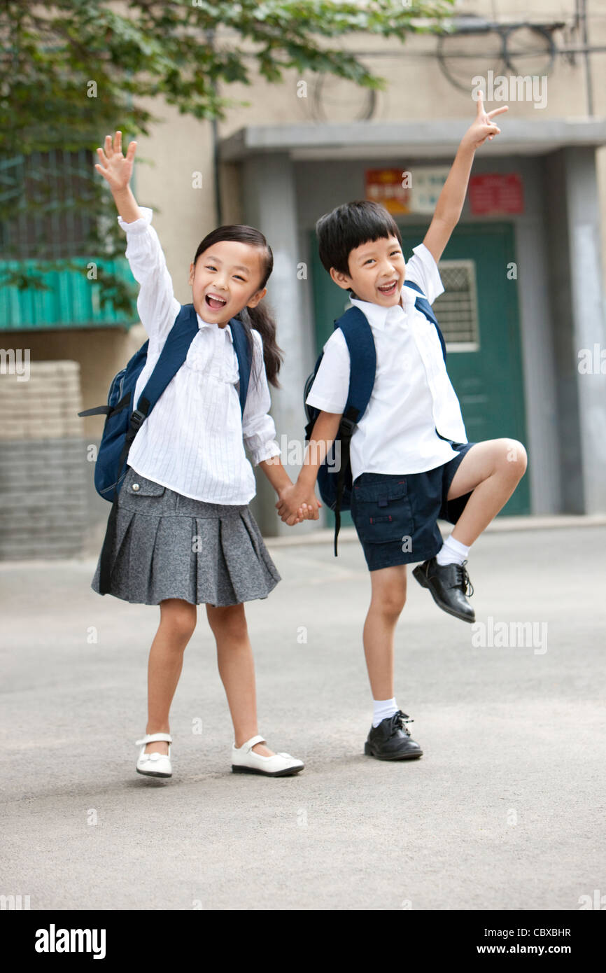 Children coming home from school Stock Photo - Alamy