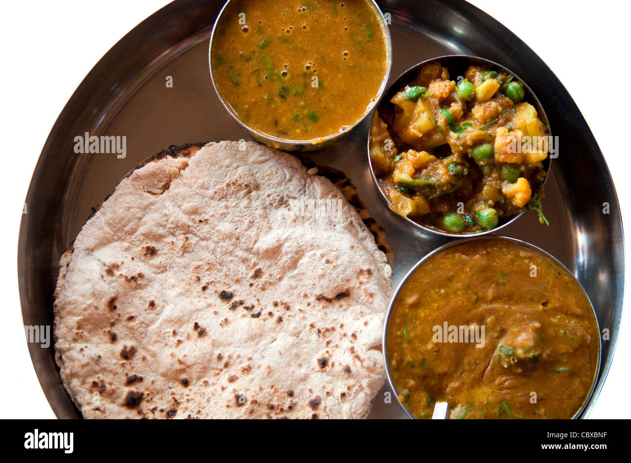 Traditional Indian cuisine vegetarian thali served in small bowls on a ...