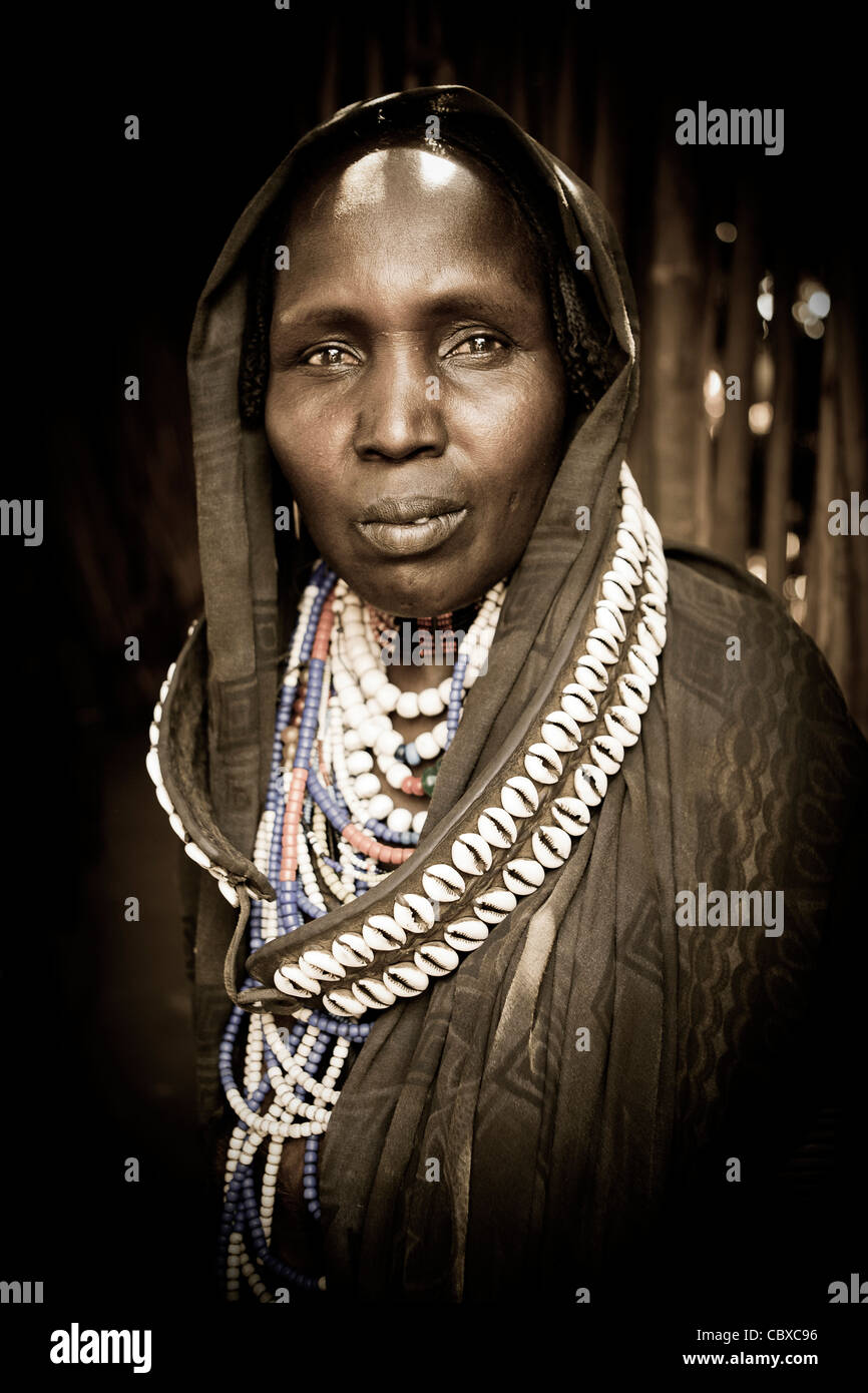 Striking portrait of a traditional Arbore tribeswoman at a village in ...