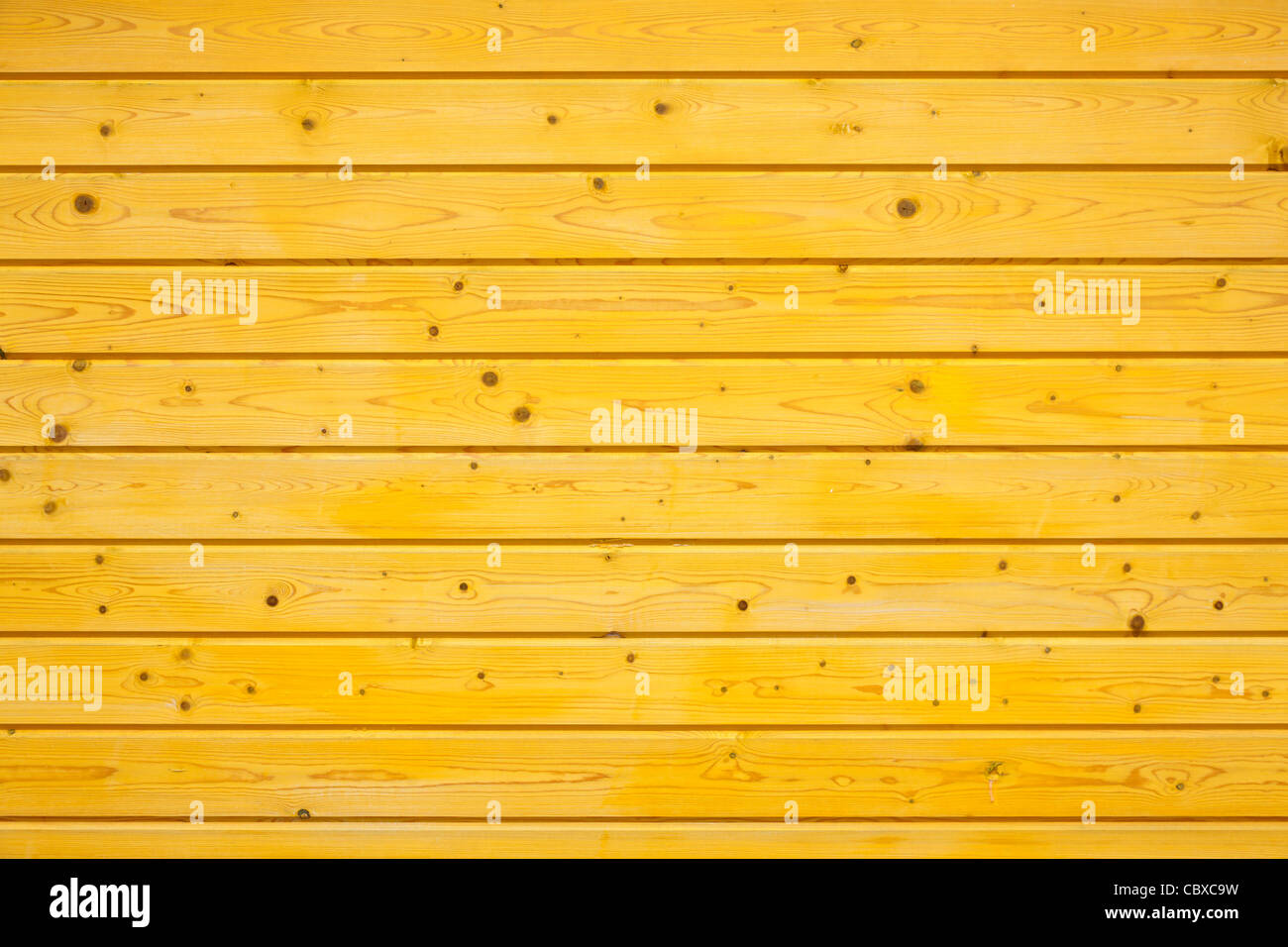 yellow wooden fence made of pine wood Stock Photo - Alamy