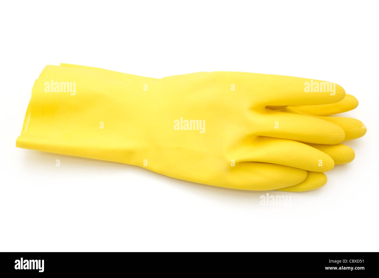 Yellow rubber gloves isolated on white Stock Photo - Alamy