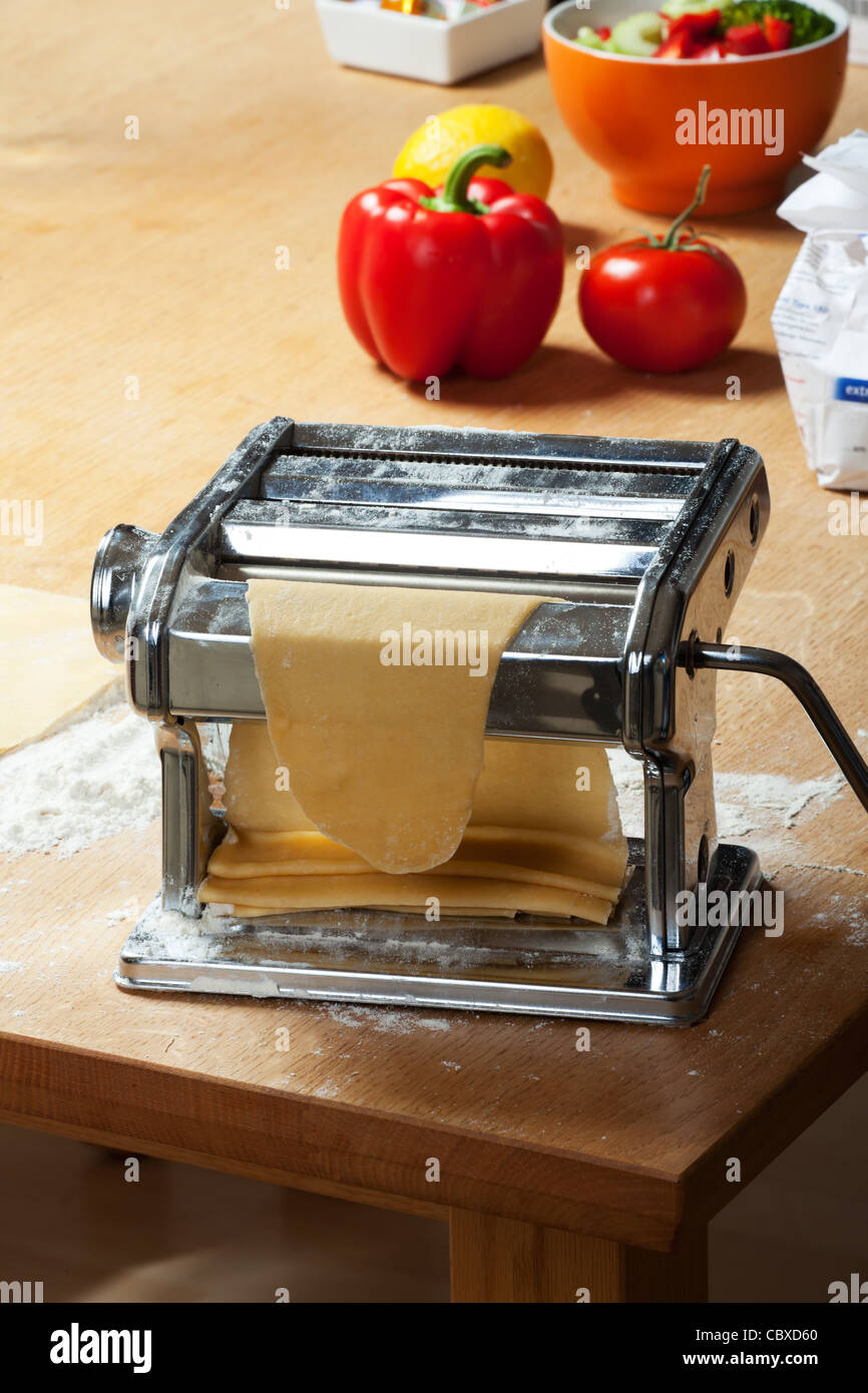 making fresh pasta with a machine Stock Photo - Alamy