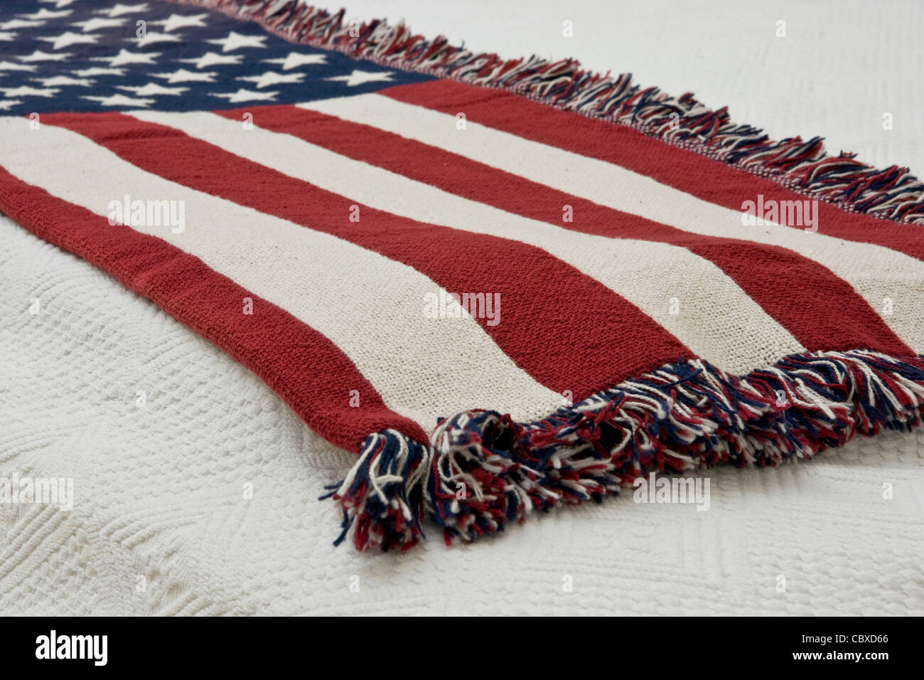 Picture of a blanket in american colors on a bed Stock Photo - Alamy
