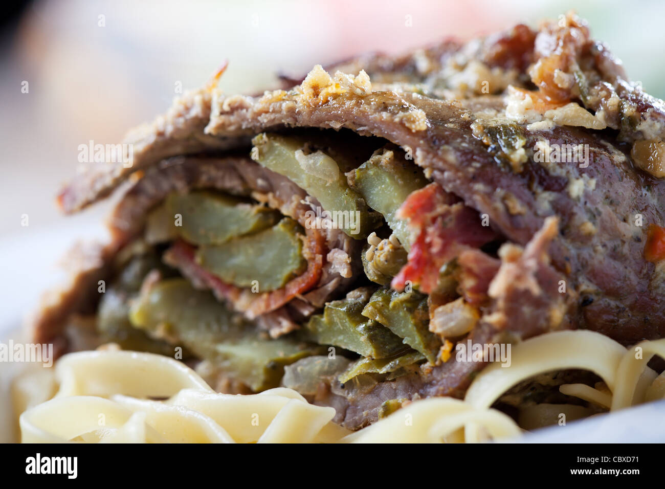 bavarian meat roulade filled with ham and gherkin Stock Photo - Alamy
