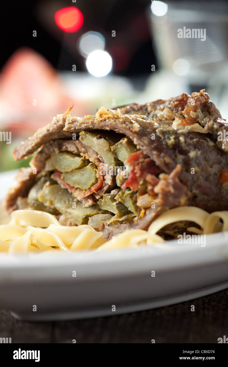 bavarian meat roulade filled with ham and gherkin Stock Photo - Alamy