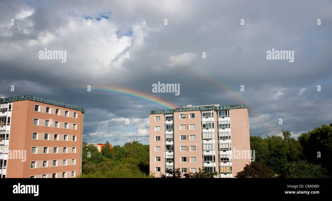 Rainbow over building Stock Photo - Alamy