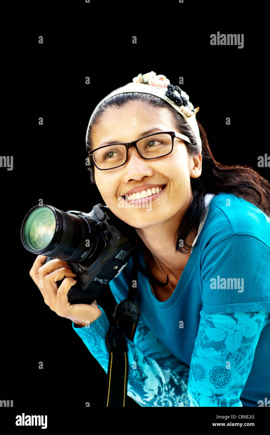Thai woman with a Nikon DSLR camera, Thailand, Asia Stock Photo - Alamy