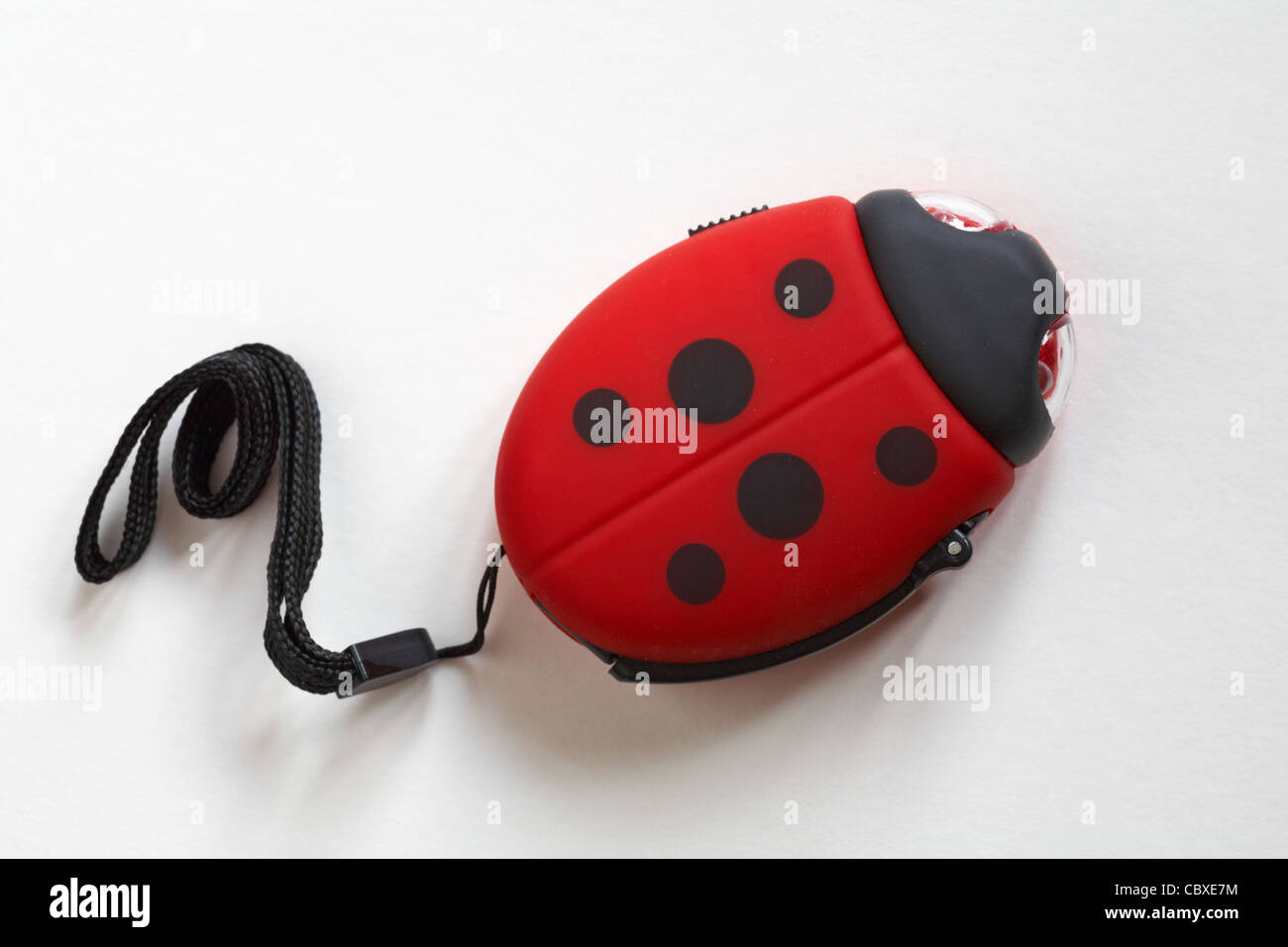 Ladybird wind up torch isolated on white background Stock Photo - Alamy