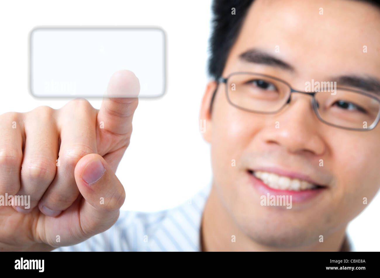 Asian business man pressing a touchscreen button Stock Photo - Alamy