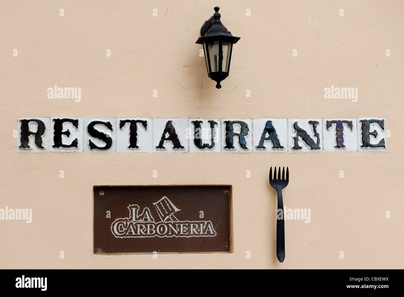 Restaurant sign in Spanish Stock Photo - Alamy