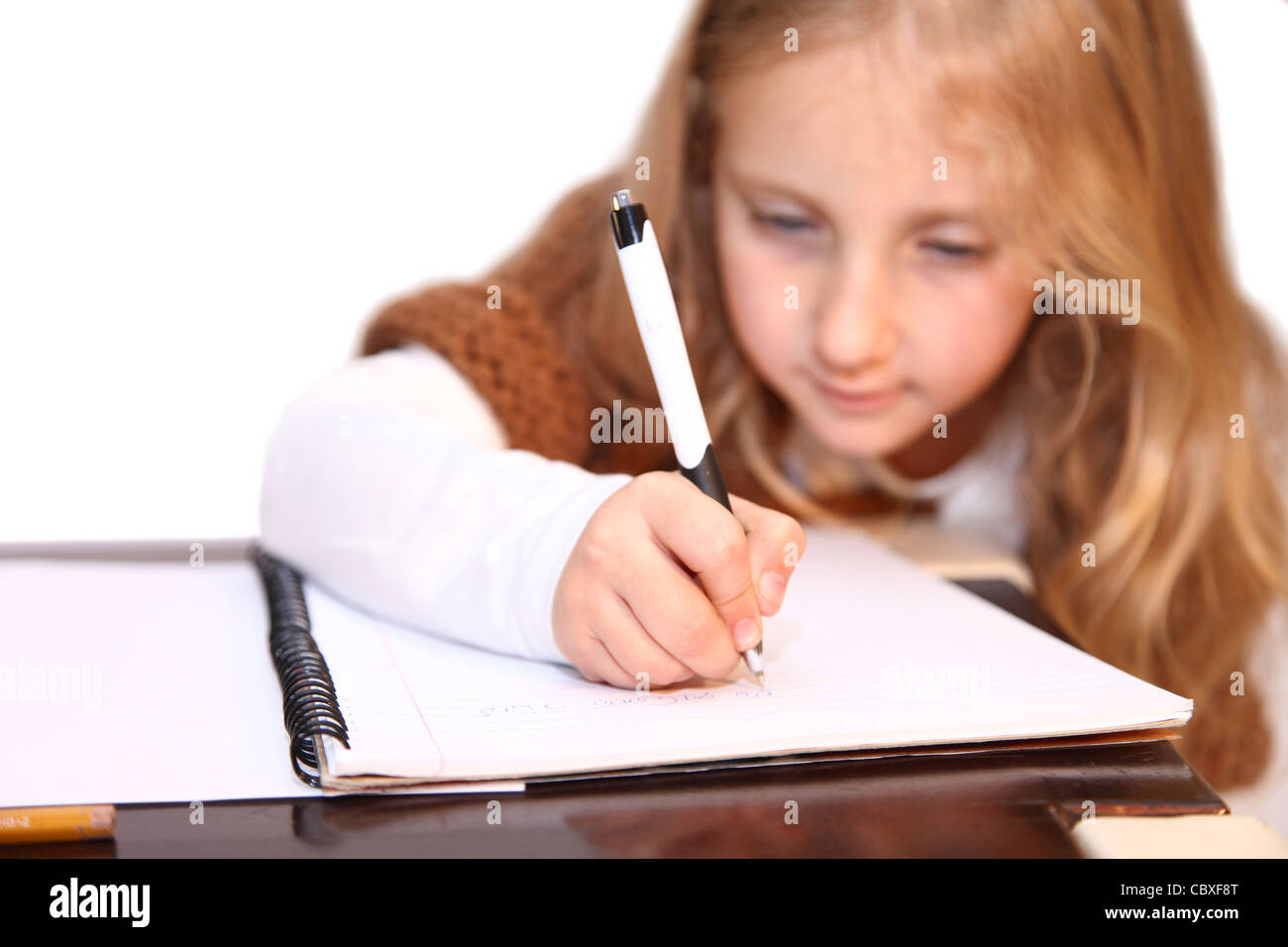 schoolgirl doing homework, lessons, read books, school Stock Photo - Alamy