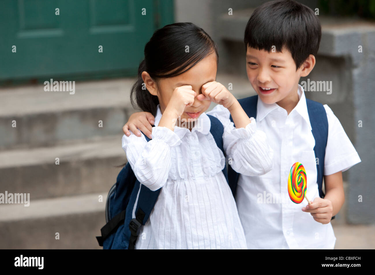 Children boys consoling hi-res stock photography and images - Alamy