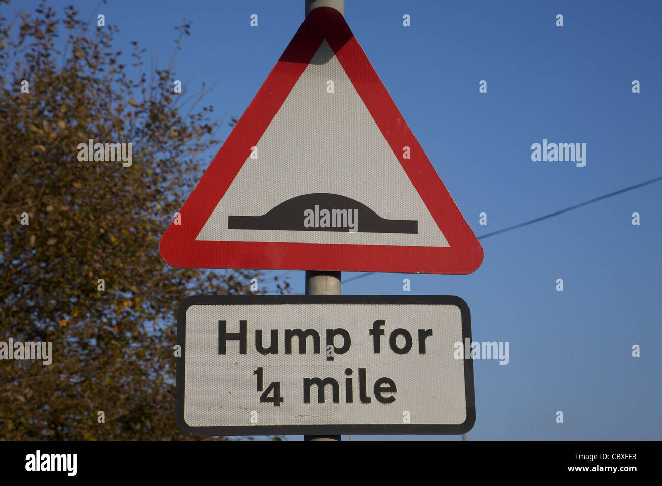 Speed hump sign, England Stock Photo - Alamy