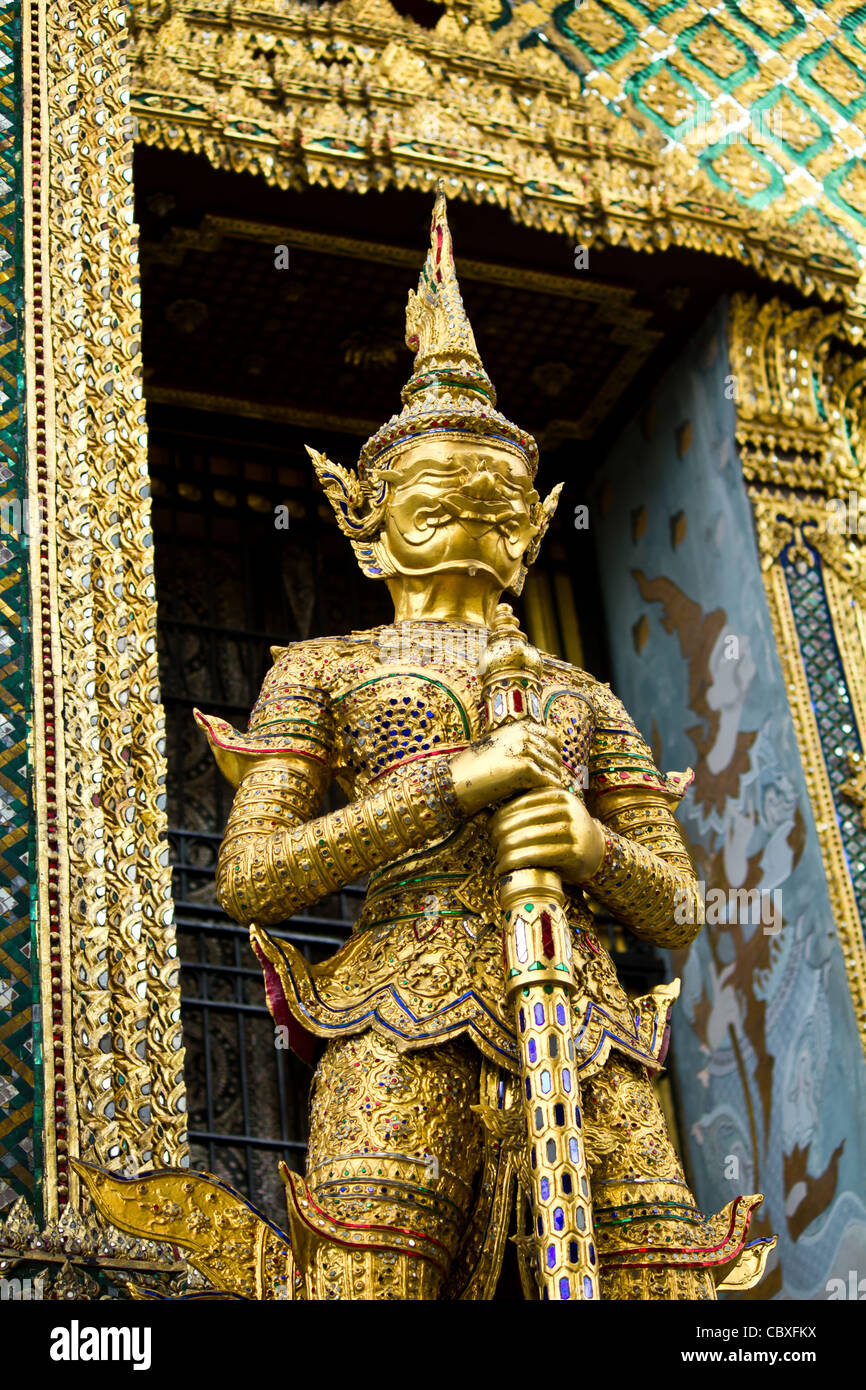 Giant stand around pagoda of thailand at wat prakeaw Stock Photo - Alamy