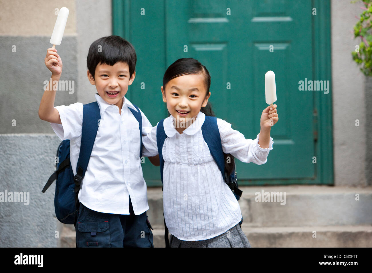 Happy children with popsicles Stock Photo - Alamy