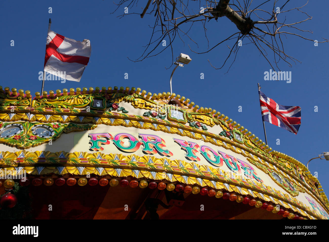 Merry-go-round Carousel at a playground in London, England, UK Stock ...