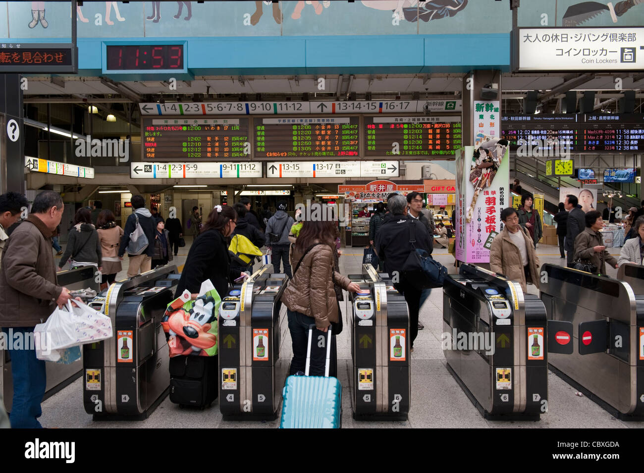 Tokyo busy subway station with commuters using the vast subway network ...
