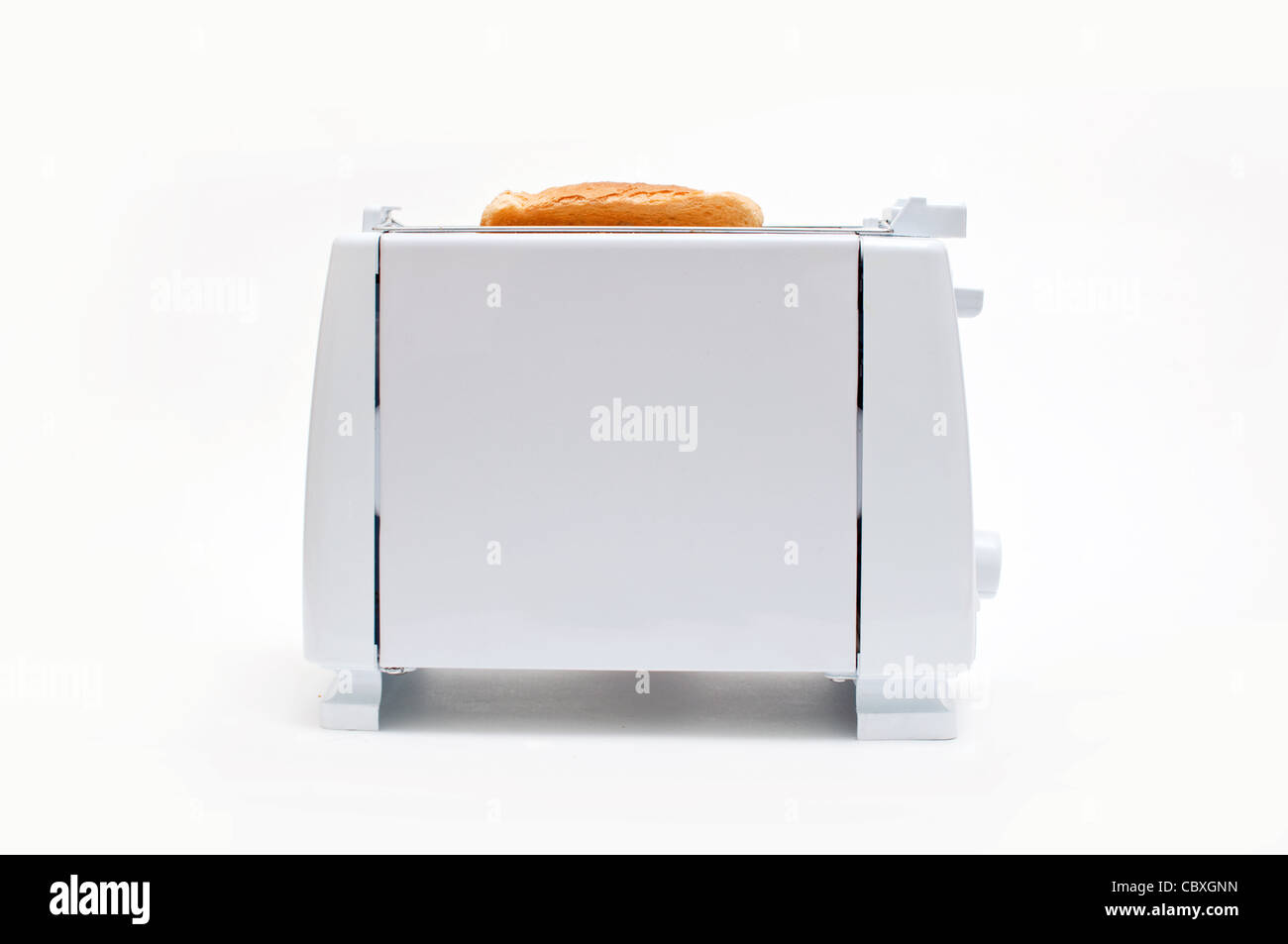 Bread Toasting device over a white background Stock Photo - Alamy