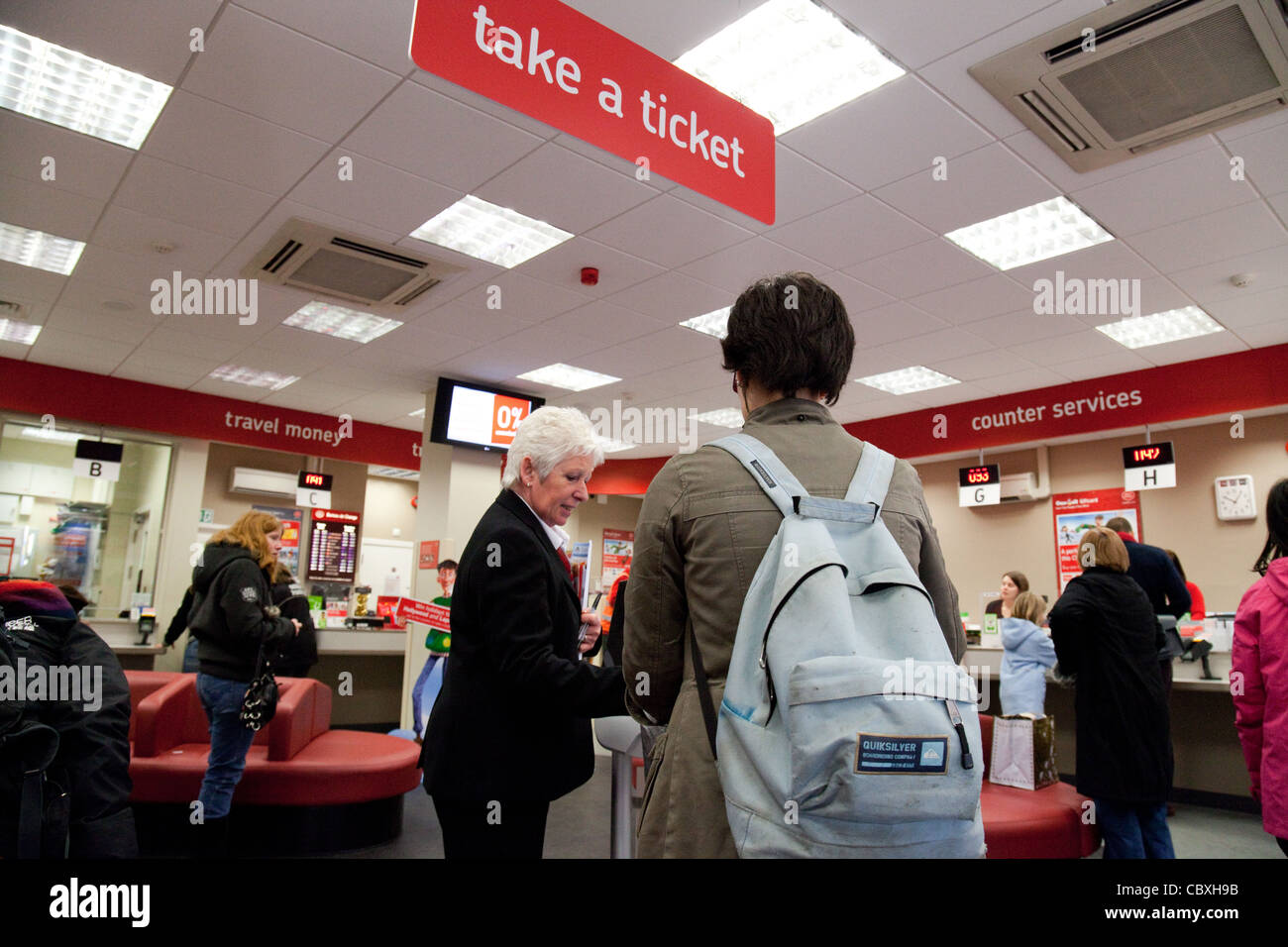 Queuing system hi-res stock photography and images - Alamy
