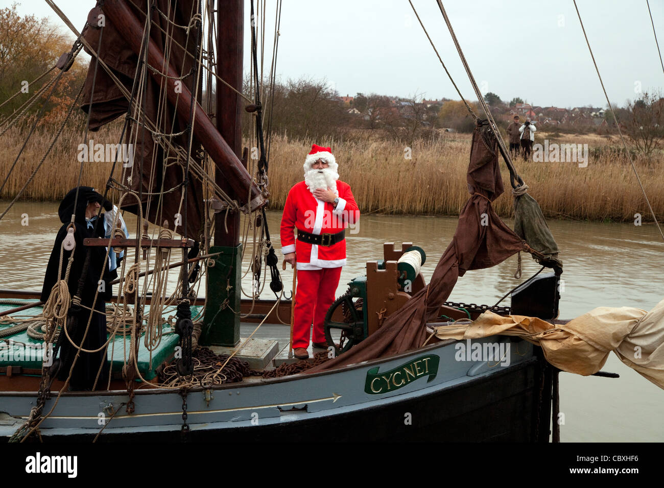 Father Christmas arriving at Snape Maltings by Thames Barge, River Alde ...