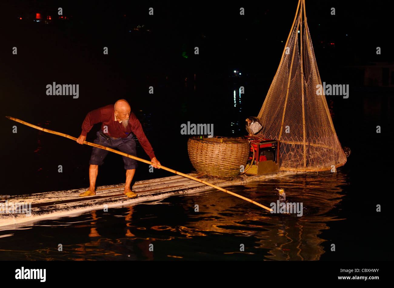 Fisherman lifting fish hi-res stock photography and images - Alamy