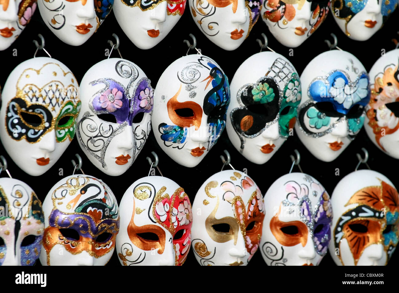Colorful Venetian masks on display Stock Photo - Alamy