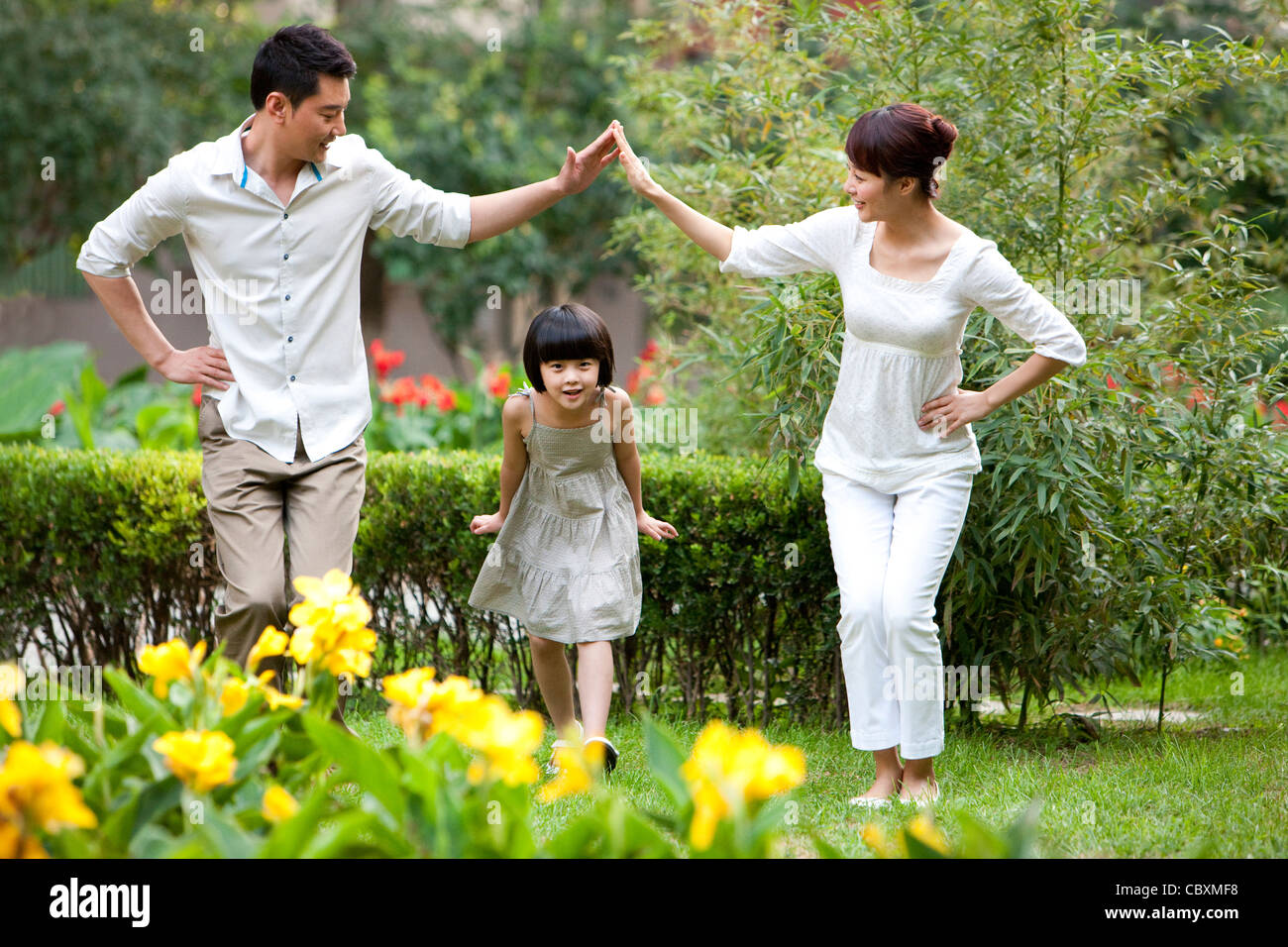 Family having fun in a common community Stock Photo - Alamy