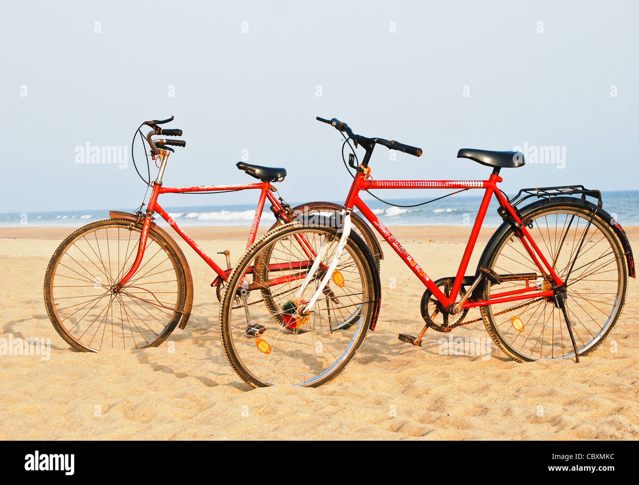 bicycle standing on the beach Stock Photo - Alamy