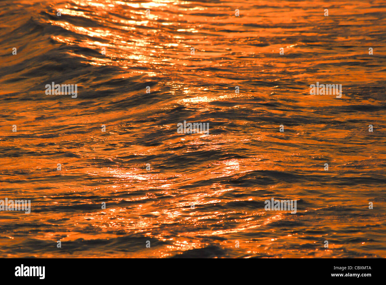 golden beach , sun light reflection on the sea beach Stock Photo - Alamy