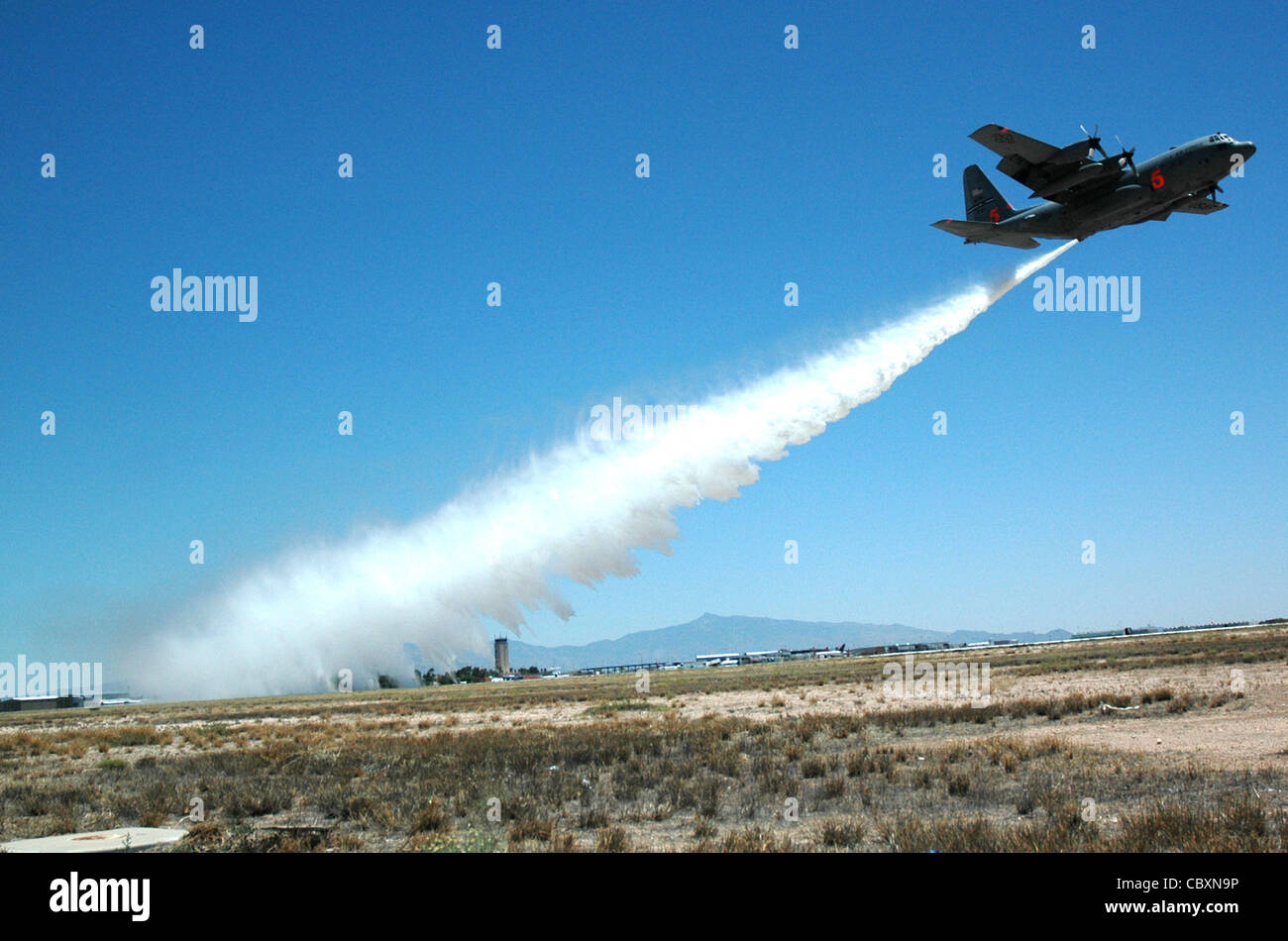 A C-130 Hercules with the Air Force Reserve's 302nd Airlift Wing from ...