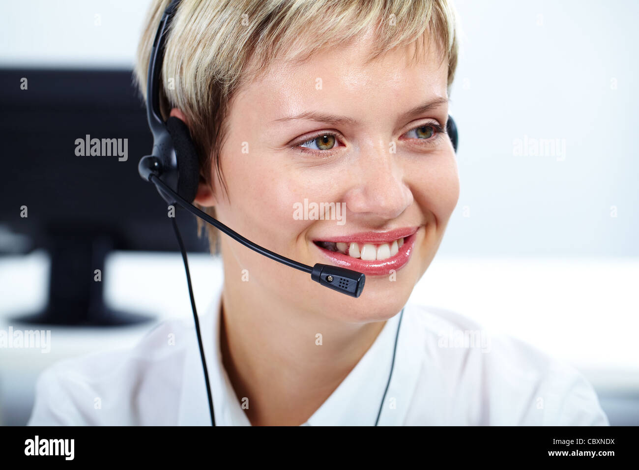 Portrait of friendly customer service representative smiling Stock ...