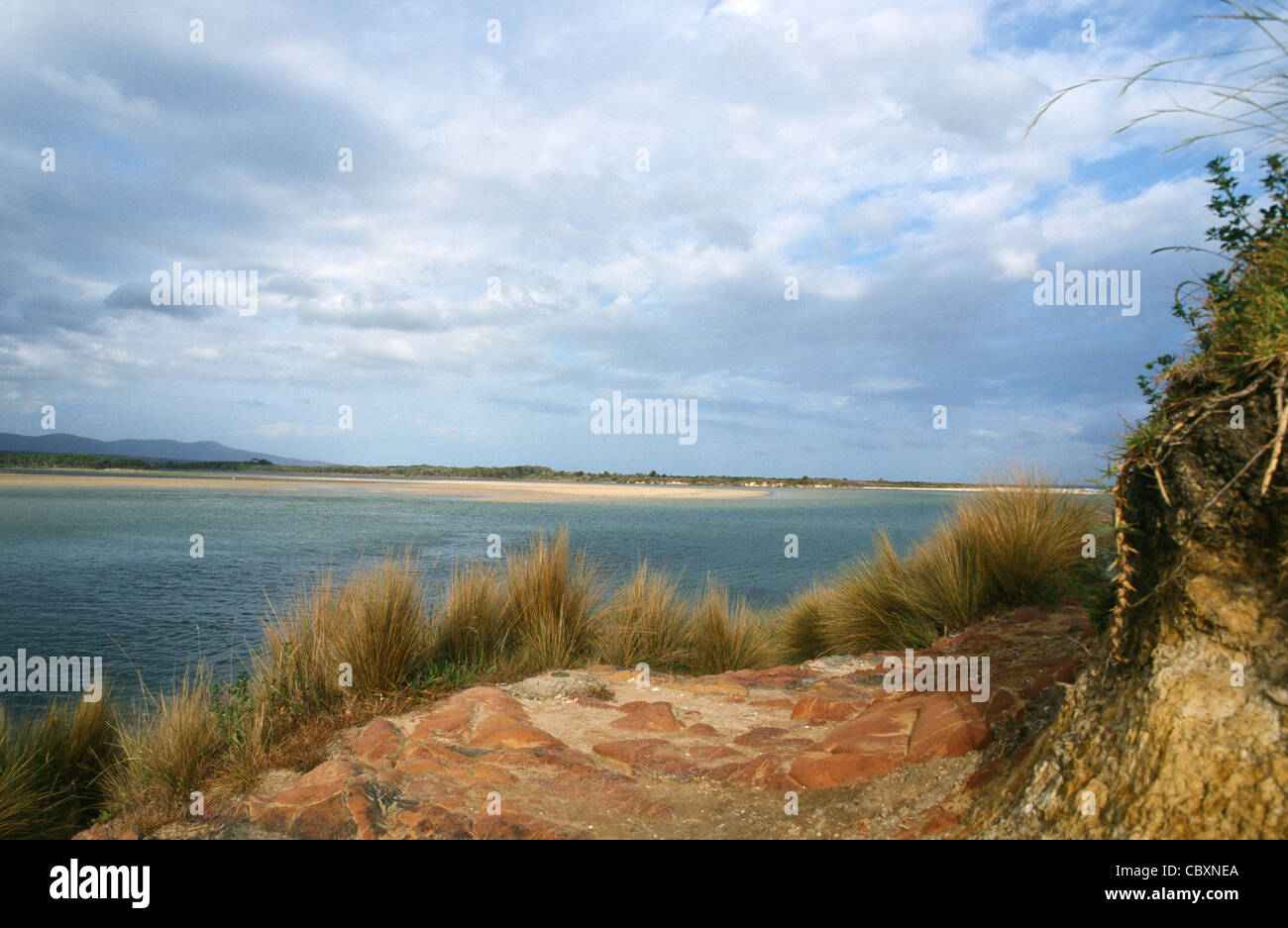 Coloured rocks at the banks of the Mallacoota Inlet, Croajingalong ...